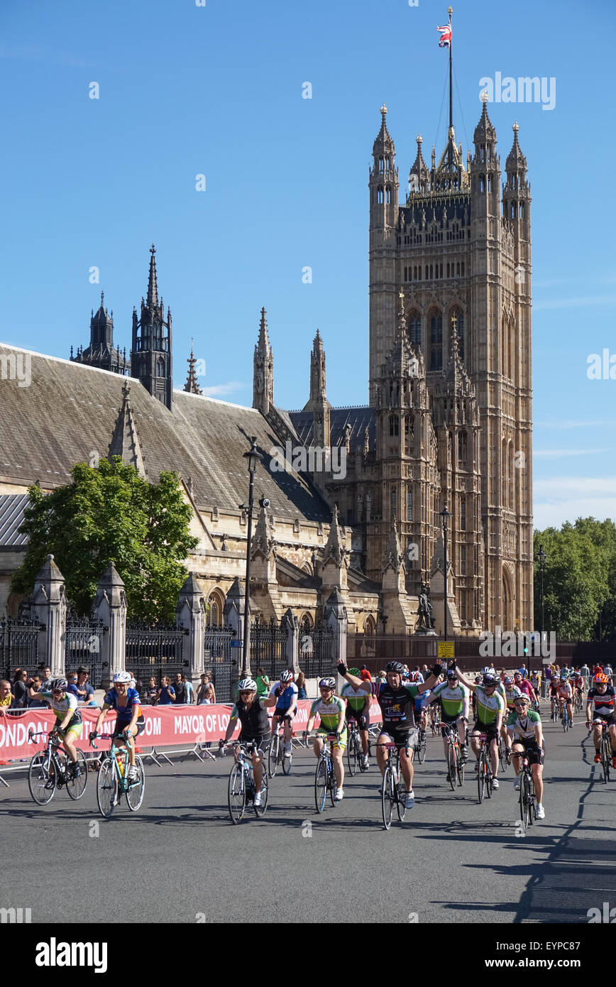 Cyclists take part in Prudential RideLondon-Surrey 100, a 100-mile ...