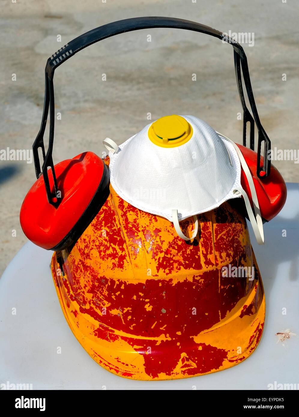 bucket with tools and construction safety equipment. Helmet, cap, mask ...