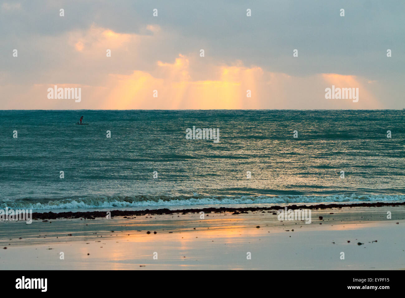 Light reflection on the ocean at sunrise Stock Photo - Alamy