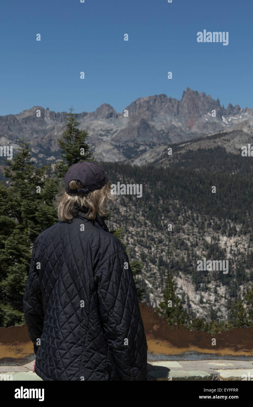 Visitors viewing the Ritter range of Mountains in the Sierra Nevada at ...