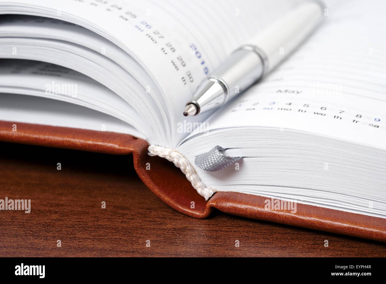 Open notebook and pen for writing Stock Photo - Alamy