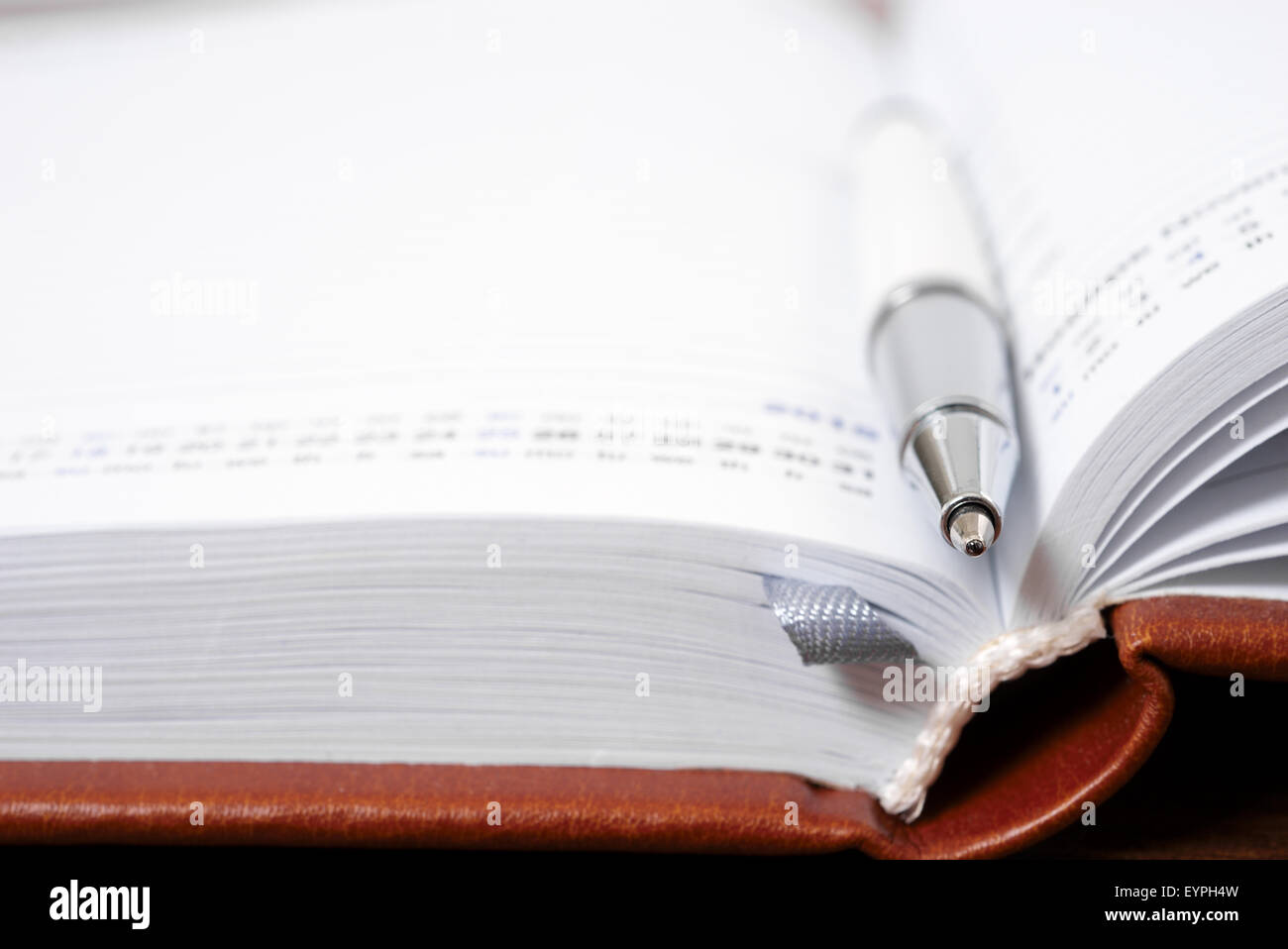 Open notebook and pen for writing Stock Photo - Alamy