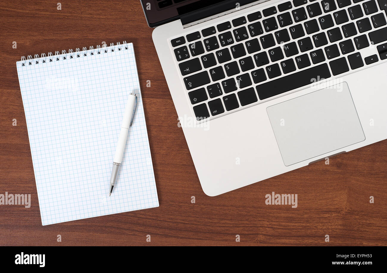 Desk laptop notepad hi-res stock photography and images - Alamy