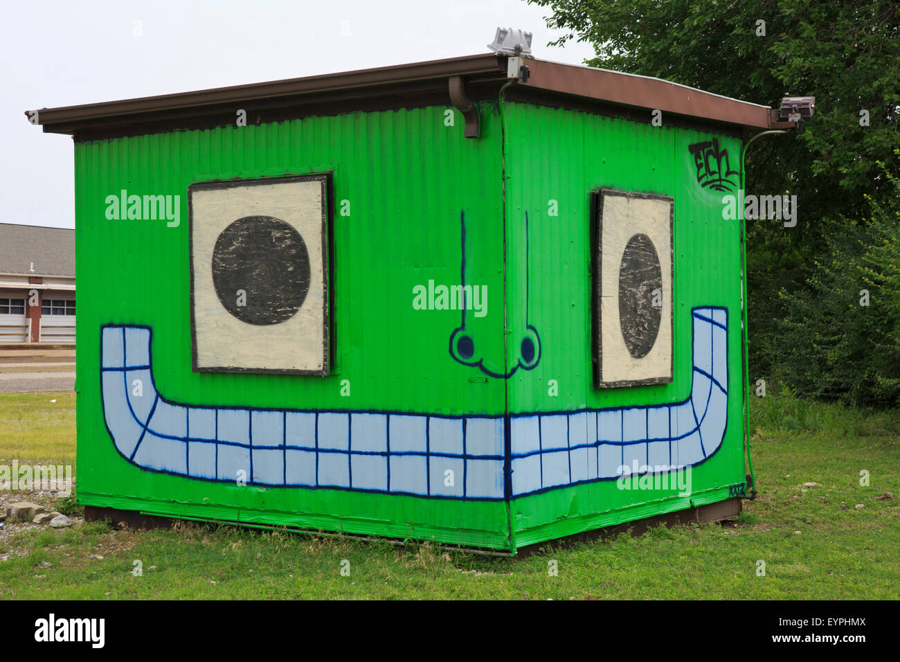 Shed decorated with eyes and a smiling face Stock Photo - Alamy