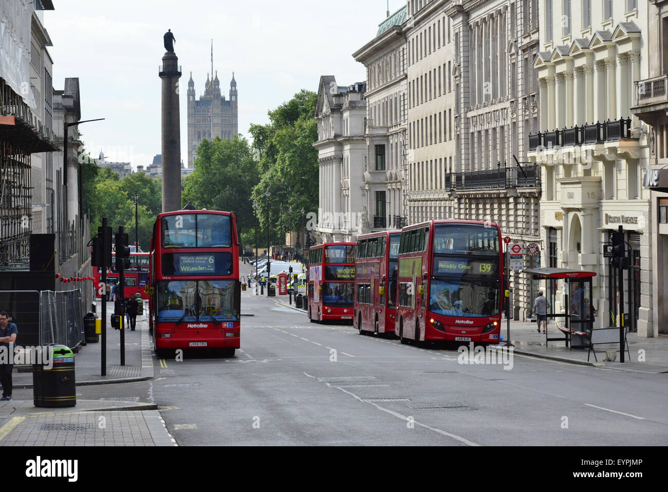 London buses in a street in London Stock Photo - Alamy