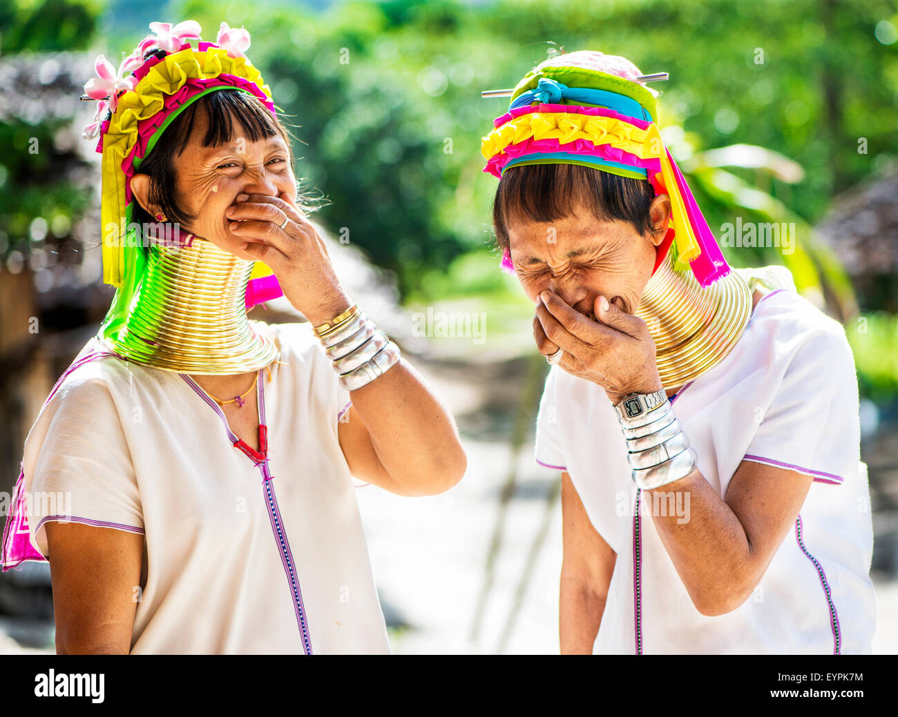 Two Kayan friends share a joke in Chiang Mai, Thailand, Asia Stock ...