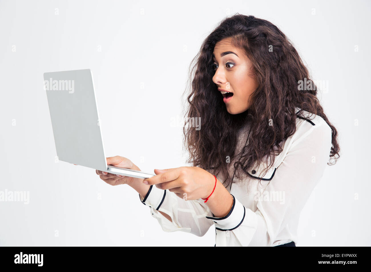 surprised businesswoman with laptop Stock Photo - Alamy