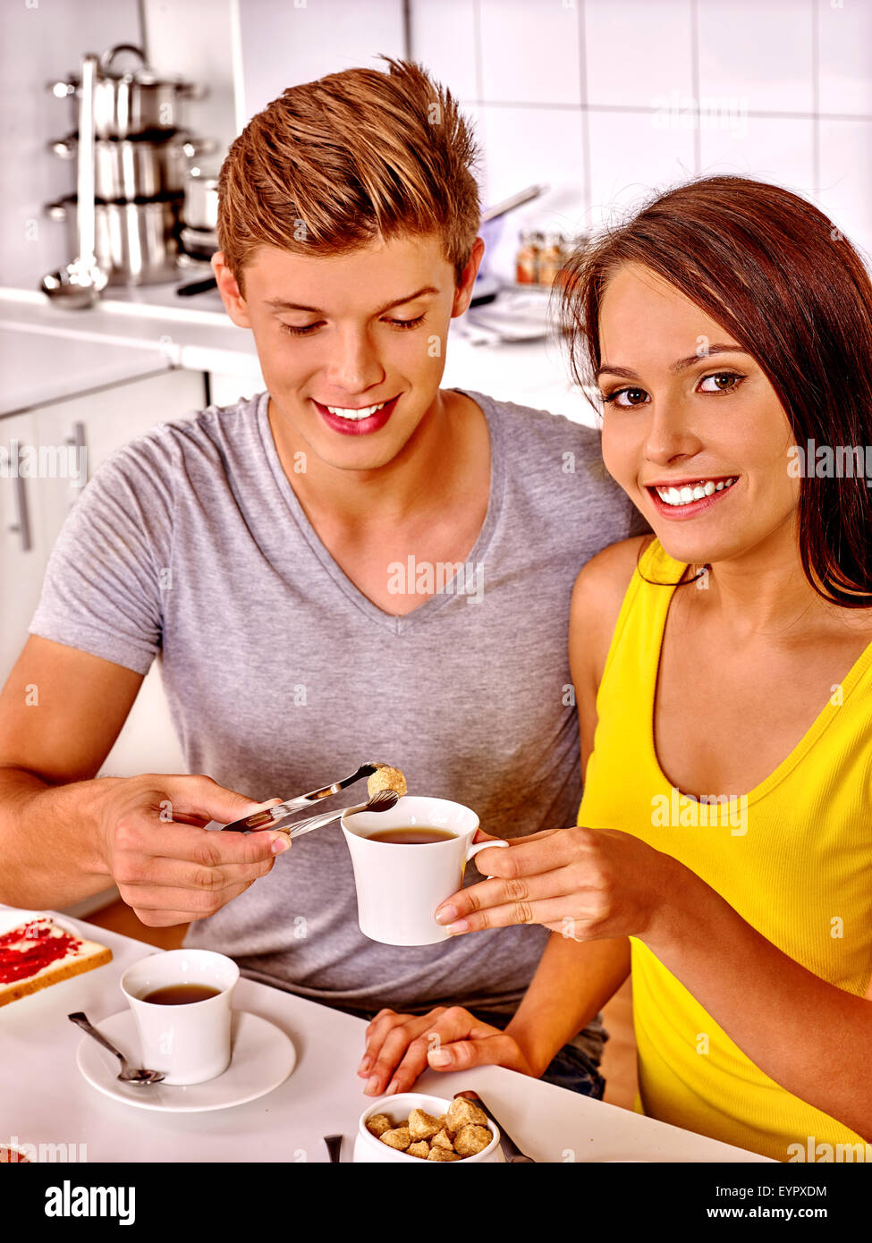 Couple breakfast at kitchen Stock Photo - Alamy