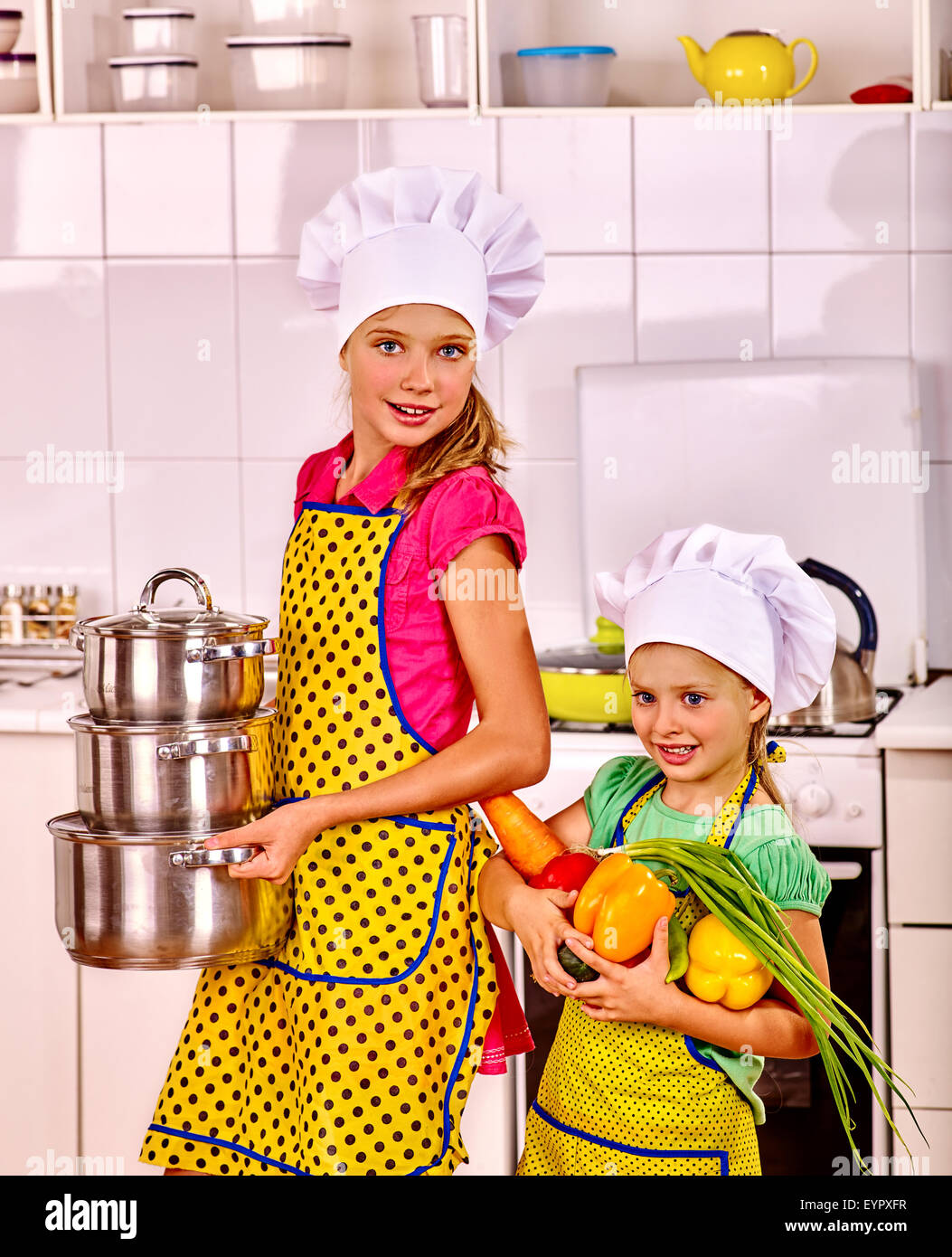 Children cooking at kitchen Stock Photo - Alamy