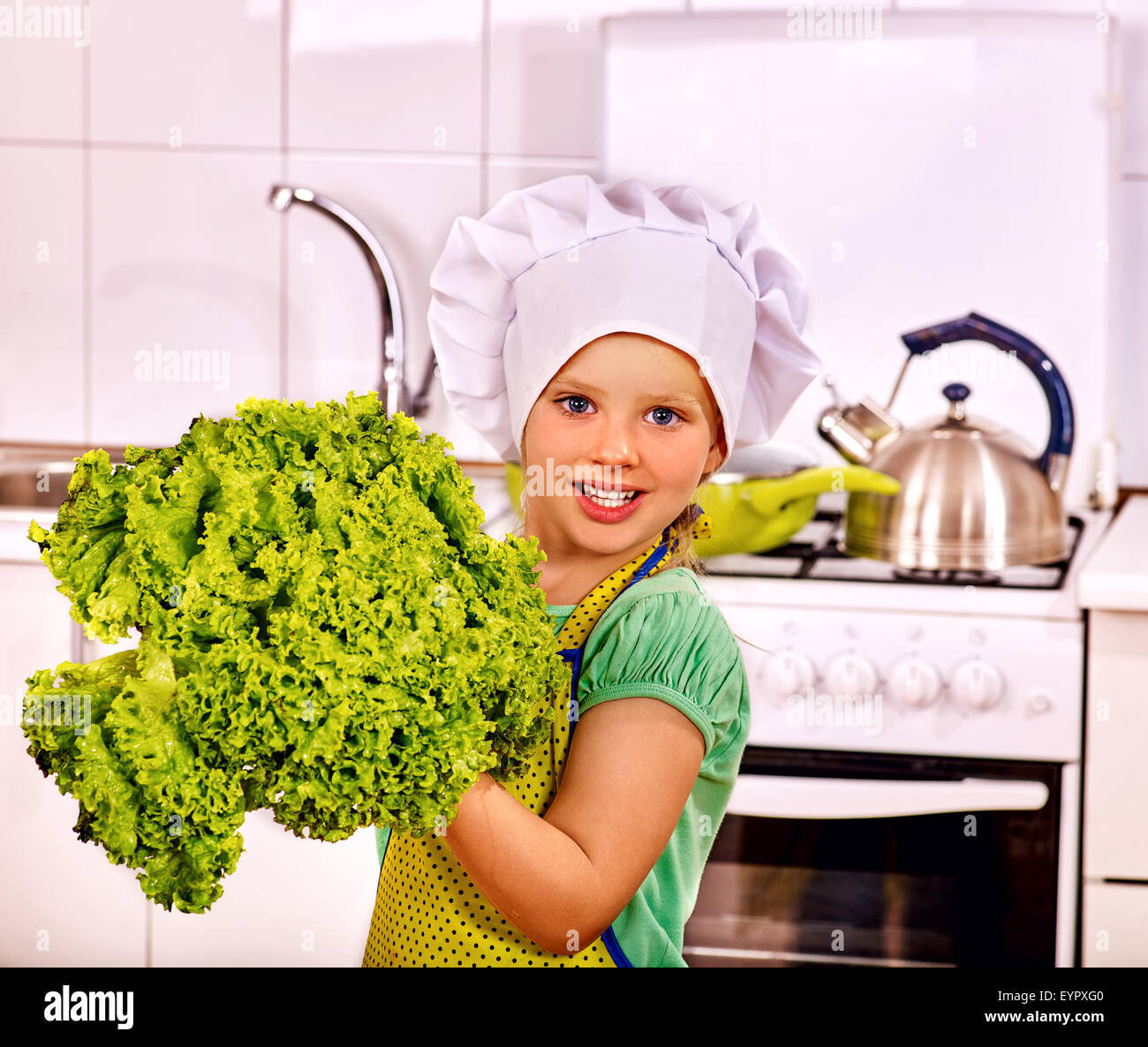 Child cooking at kitchen Stock Photo - Alamy
