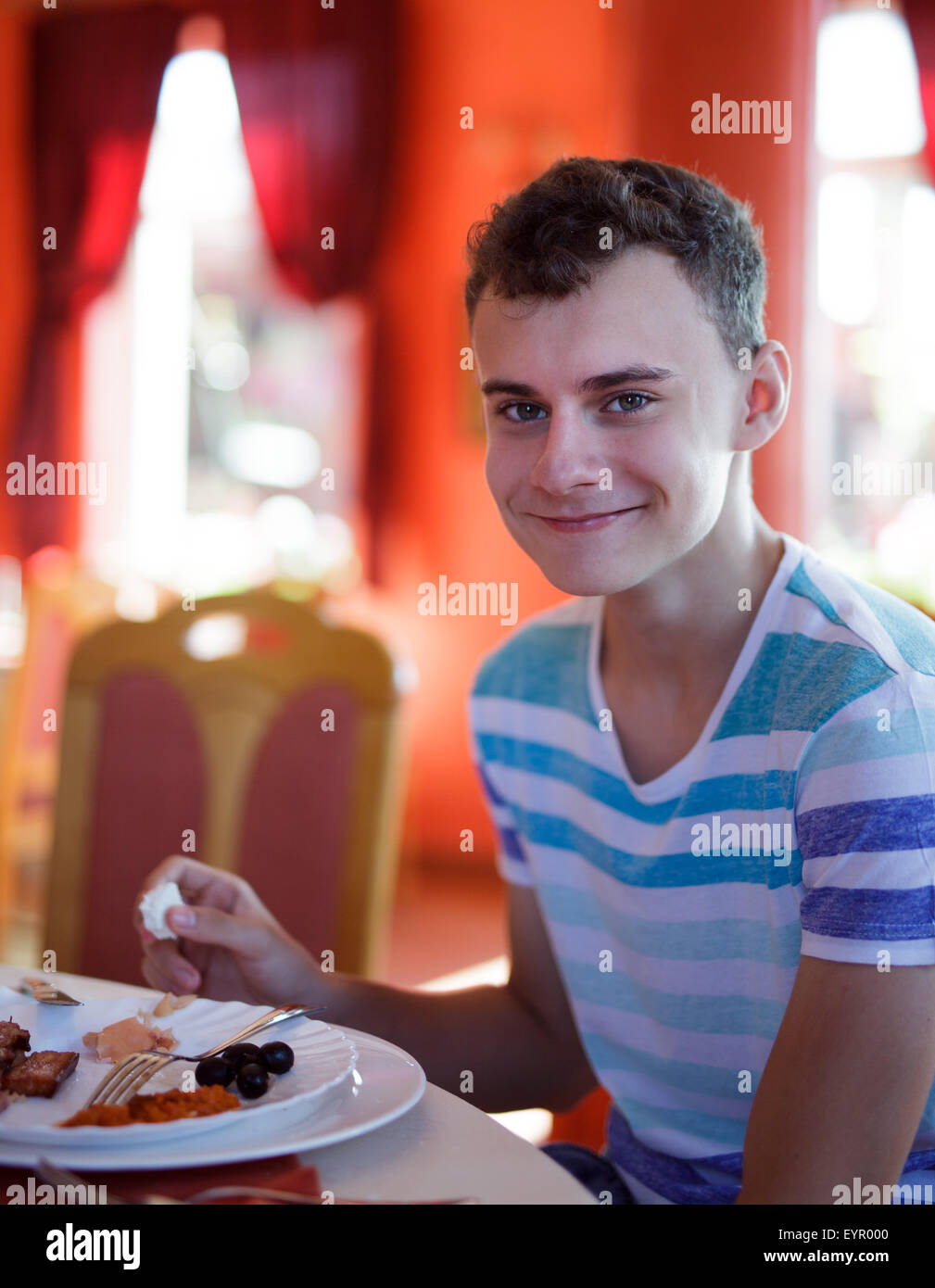 Teenager boy breakfast hi-res stock photography and images - Alamy