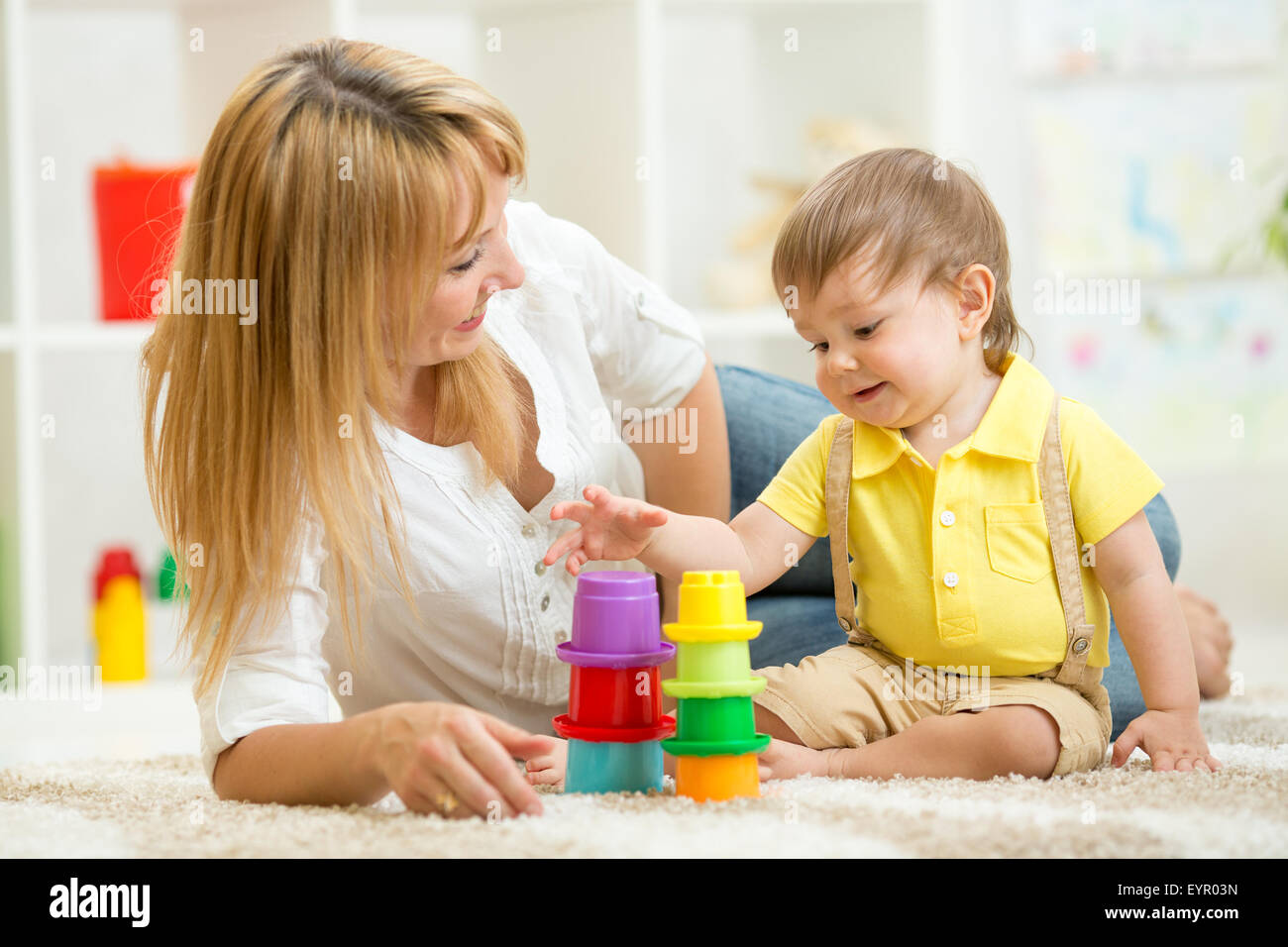 mom and child playing block toys at home Stock Photo - Alamy
