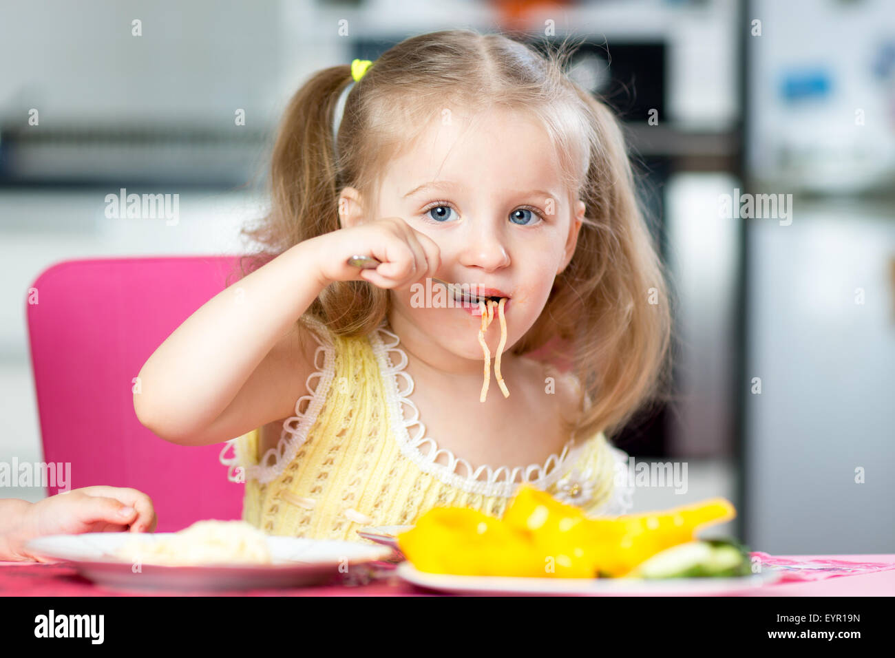 kid eating healthy food at home Stock Photo - Alamy
