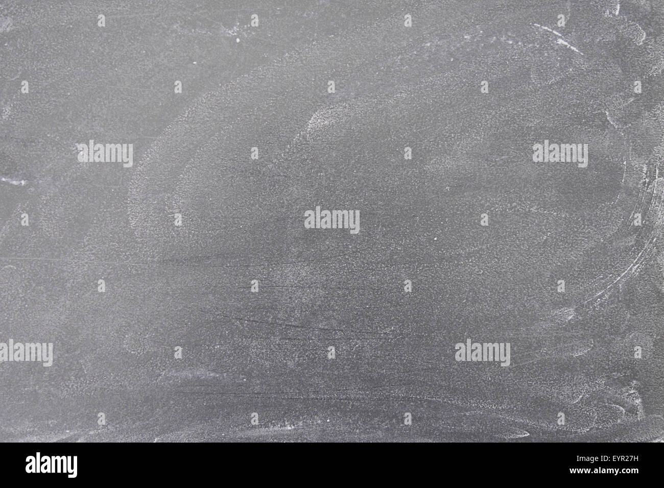 Closeup of a section of blackboard with wiped chalk marks Stock Photo ...