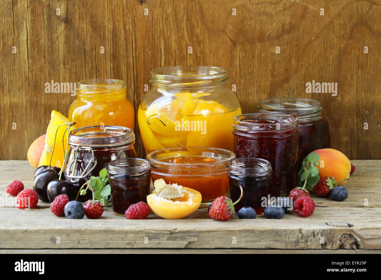 Assorted fruit berry jams (apricot, strawberry, raspberry, orange Stock ...
