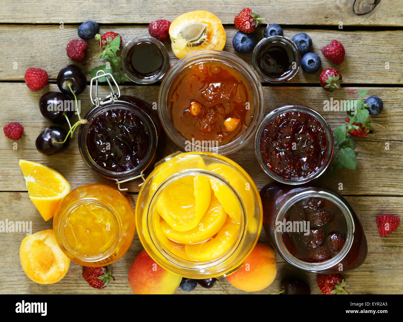 Assorted fruit berry jams (apricot, strawberry, raspberry, orange Stock ...
