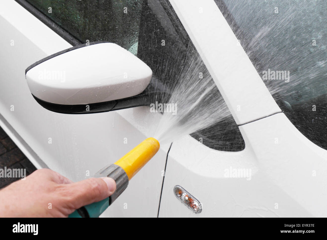 Washing car hose hi-res stock photography and images - Alamy