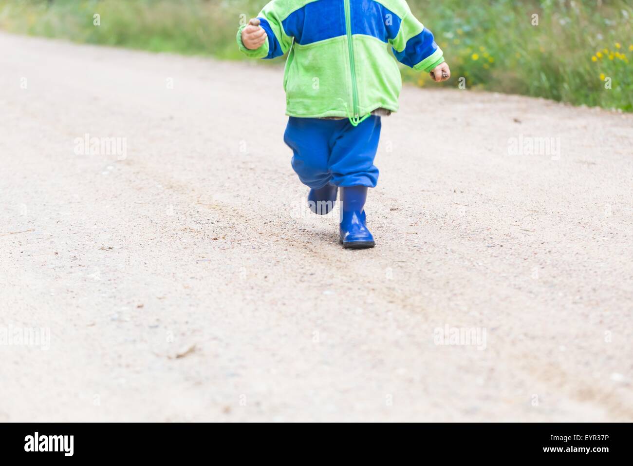 Boy girl running outside in hi-res stock photography and images - Alamy