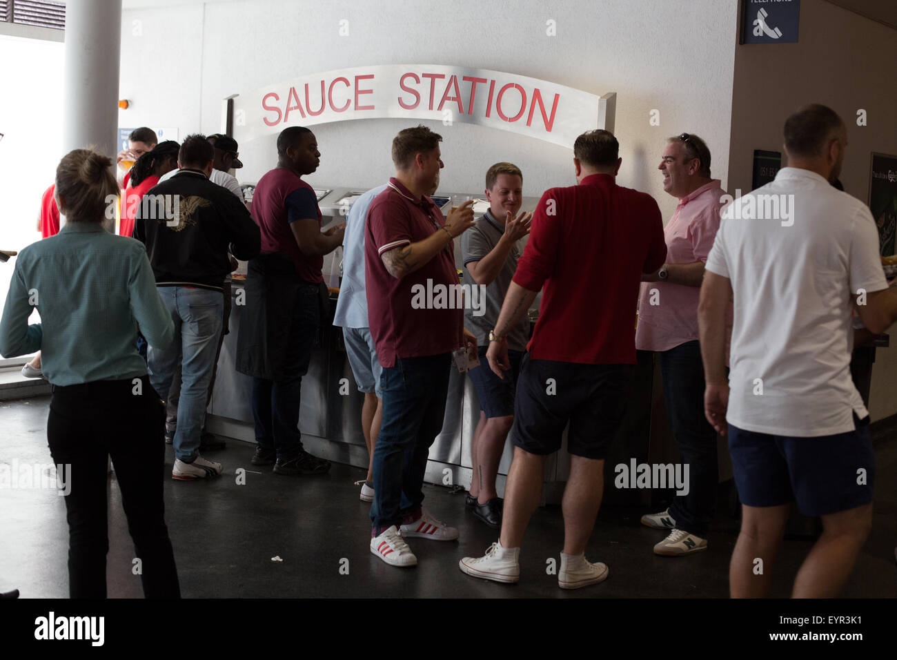 Football supporters eating inside Wembley Stadium prior to the match ...