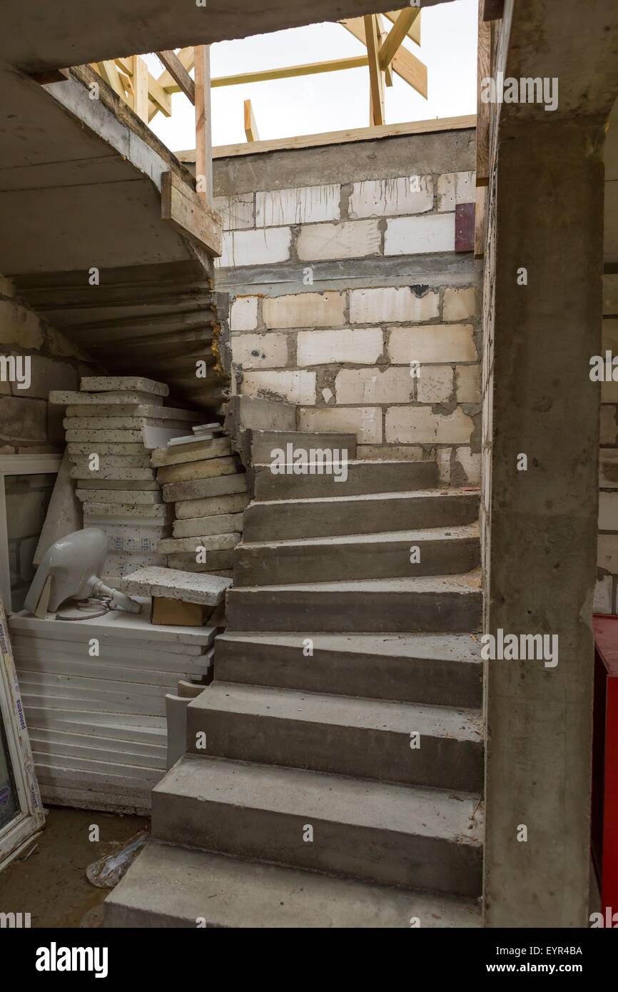 Unfinished house in countryside. Building a house in european village ...