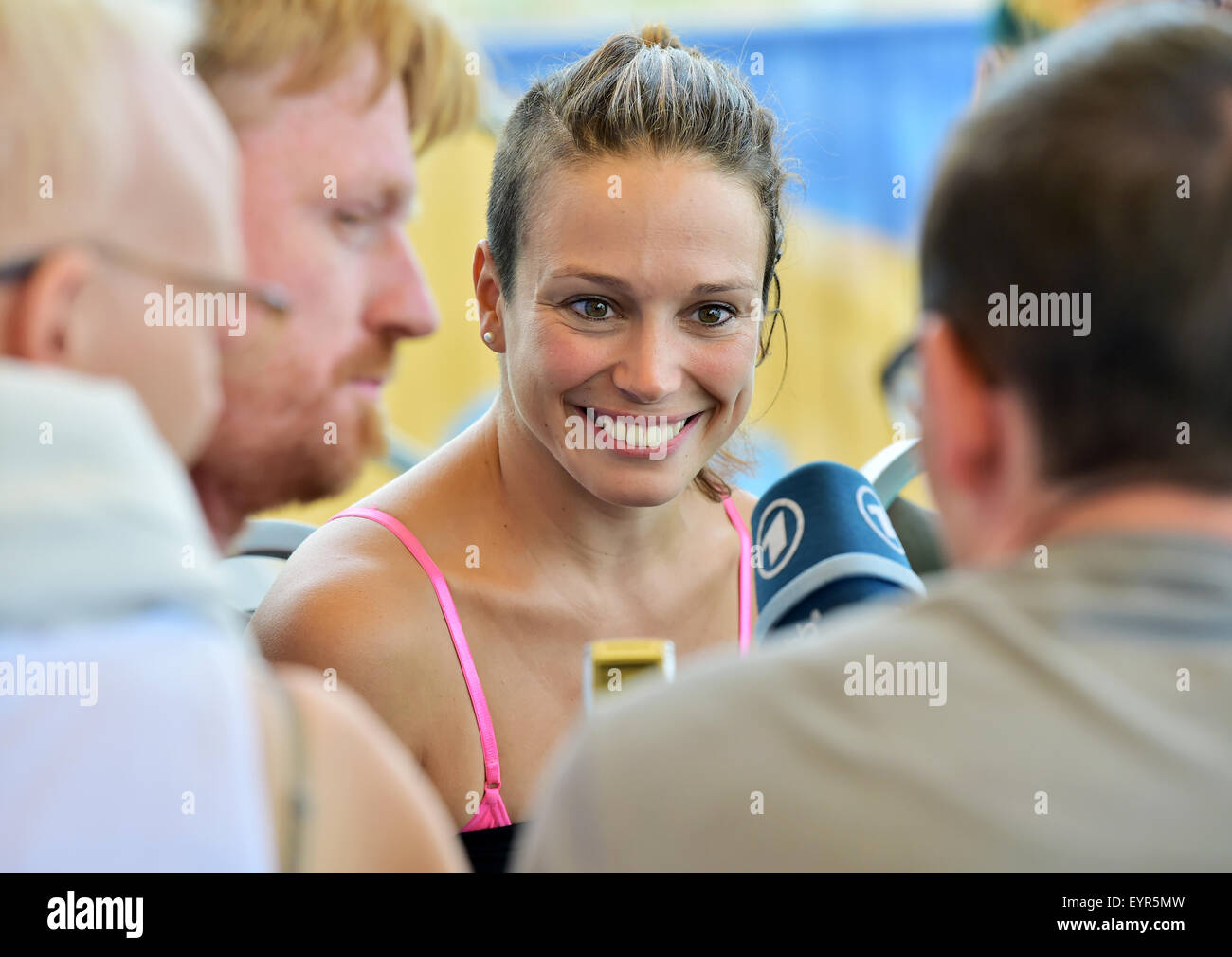 Kazan, Russia. 03rd Aug, 2015. High diver Anna Bader of Germany talks ...