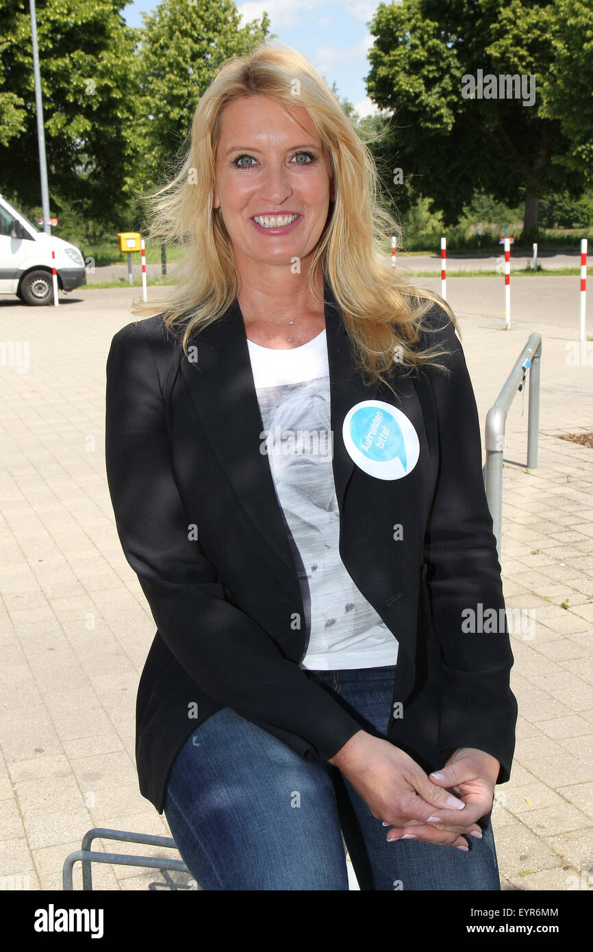 Claudia Kleinert behind the counter during "Woche des Aufrundens" by ...