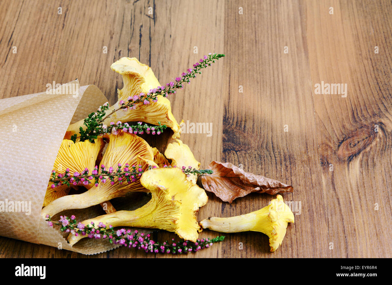 paper bag with golden canterelle and erica flower Stock Photo - Alamy