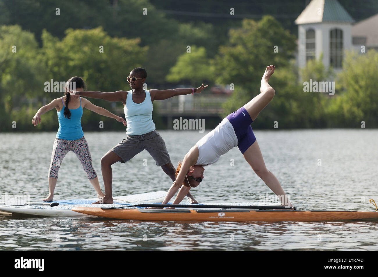 Ann Arbor, MI, USA. 29th July, 2015. Yoga on standup paddleboards at ...