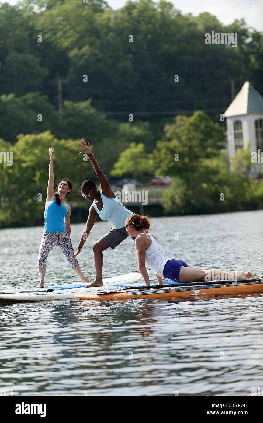 Ann Arbor, MI, USA. 29th July, 2015. Yoga on standup paddleboards at ...
