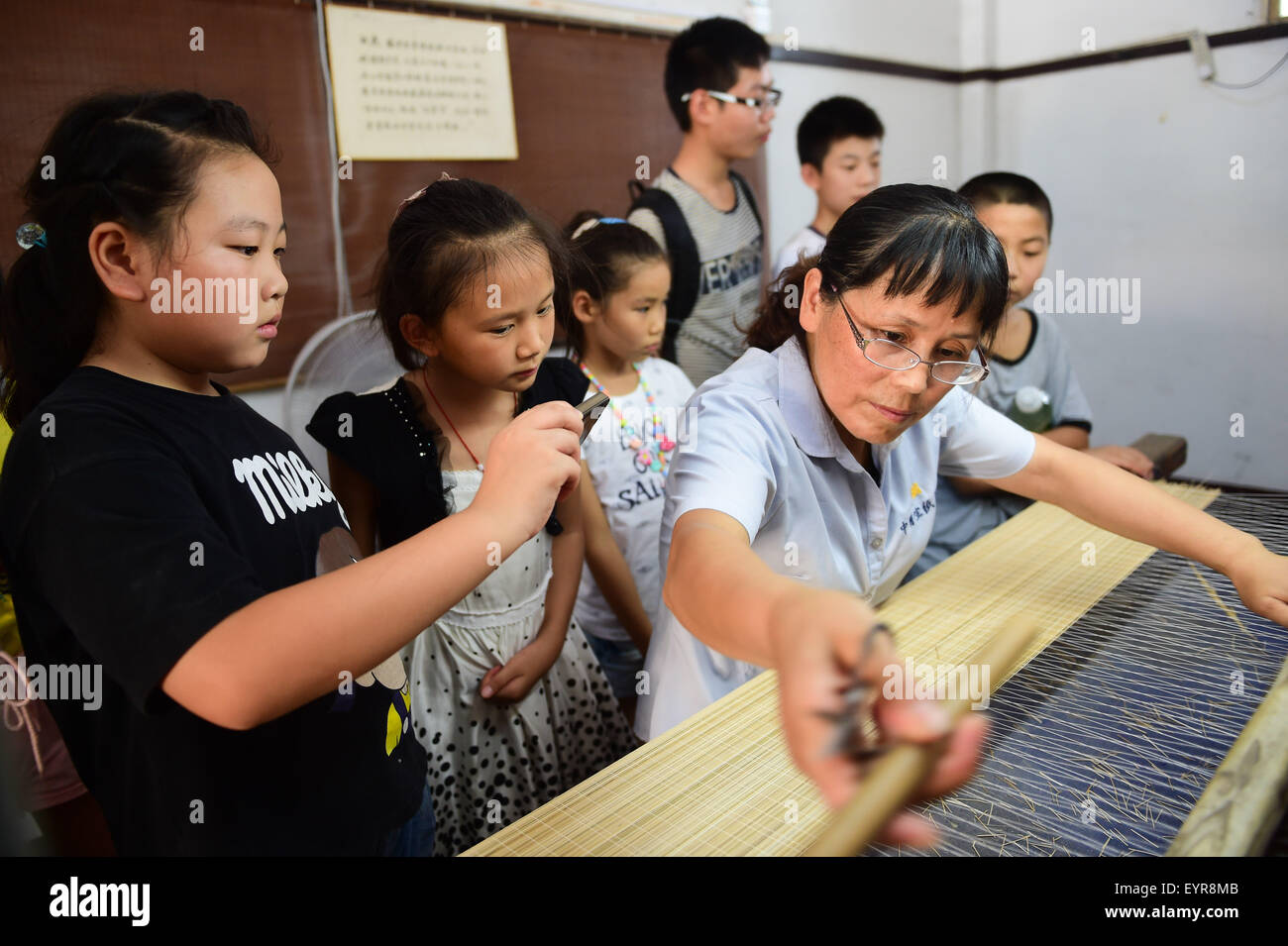 Xuancheng, China's Anhui Province. 3rd Aug, 2015. Students view an ...