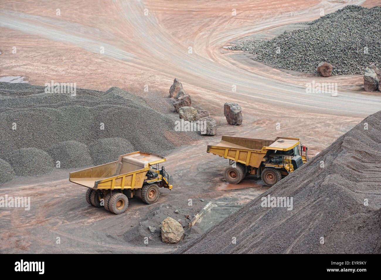 dumper trucks parking in a surface mine. mining industry Stock Photo ...