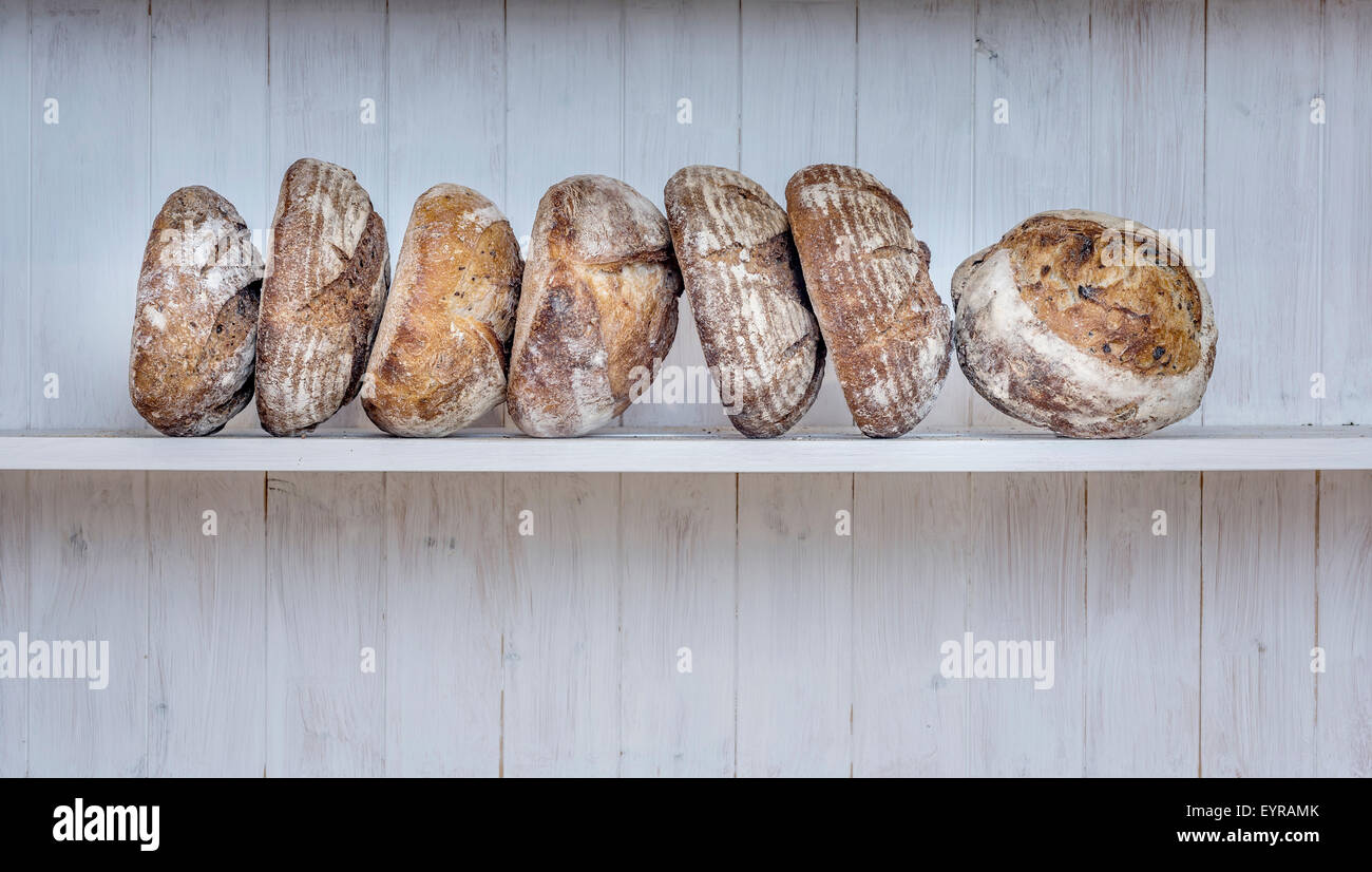 Various traditionally made sourdough breads in a bakery, Devon UK Stock ...