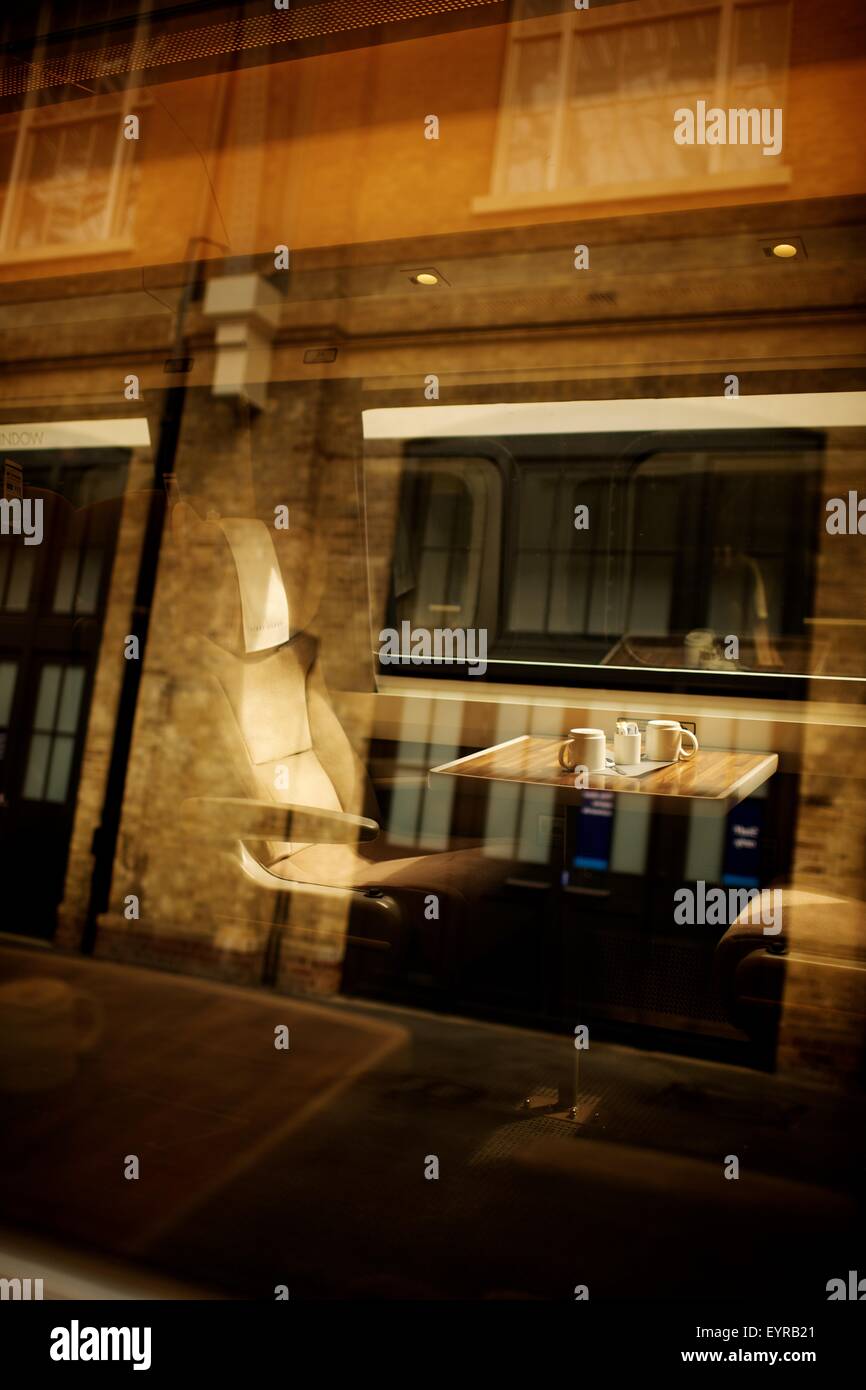 reflection in train window of platform at Kings Cross station Stock ...