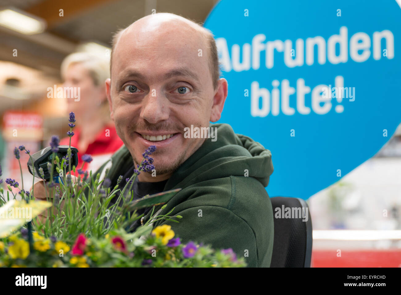 Bernhard Hoecker behind the counter during "Woche des Aufrundens" by ...
