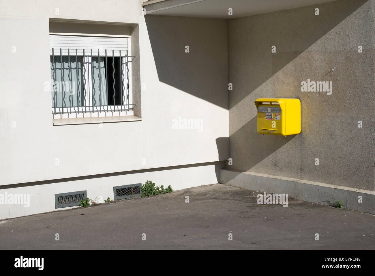french yellow letter box Stock Photo - Alamy
