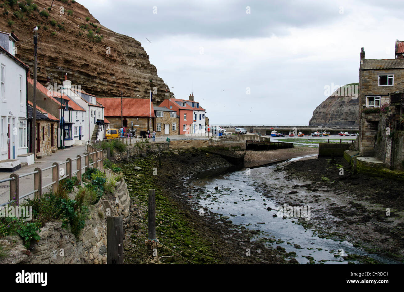 Low tide at the attractive village of Staithes on the North Yorkshire ...
