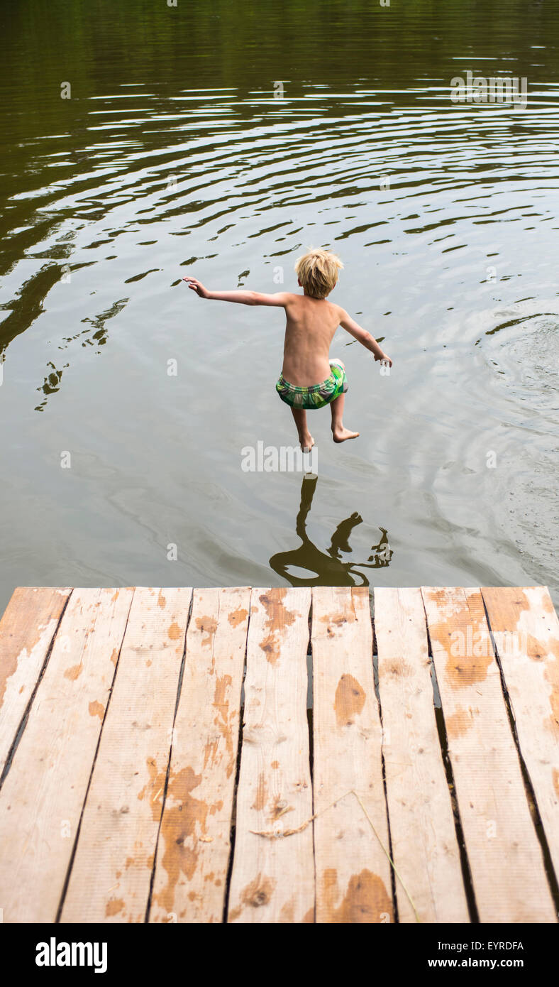 Boy Jumping Off Pier High Resolution Stock Photography and Images - Alamy