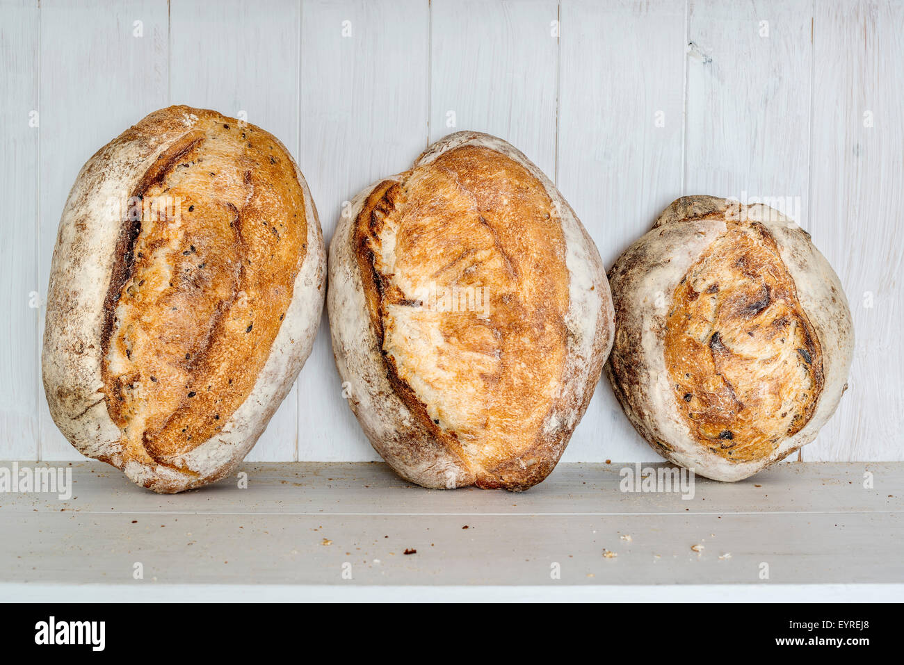 Various traditionally made sourdough breads in a bakery, Devon UK Stock ...