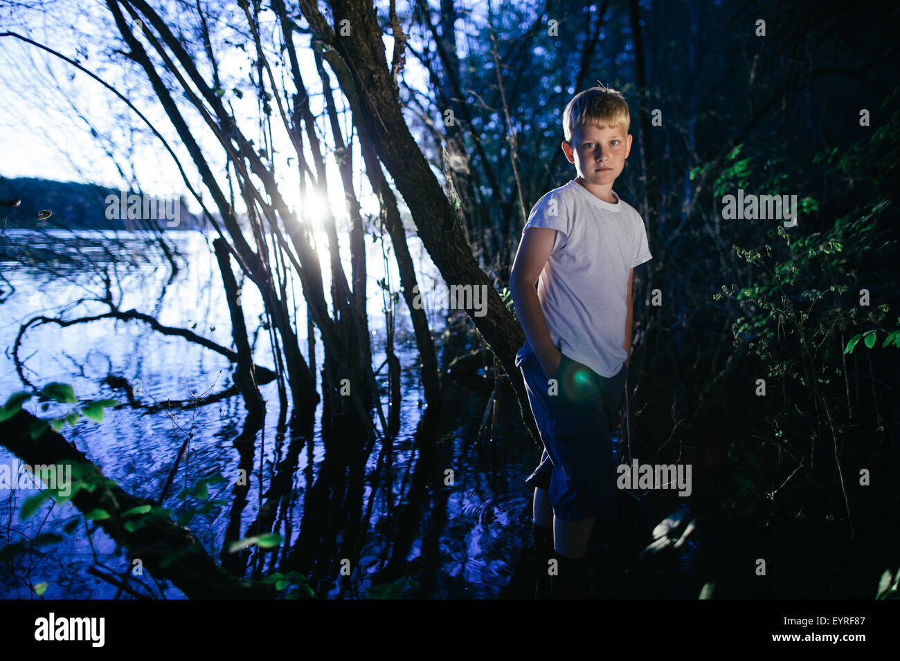 little boy on swamp Stock Photo - Alamy