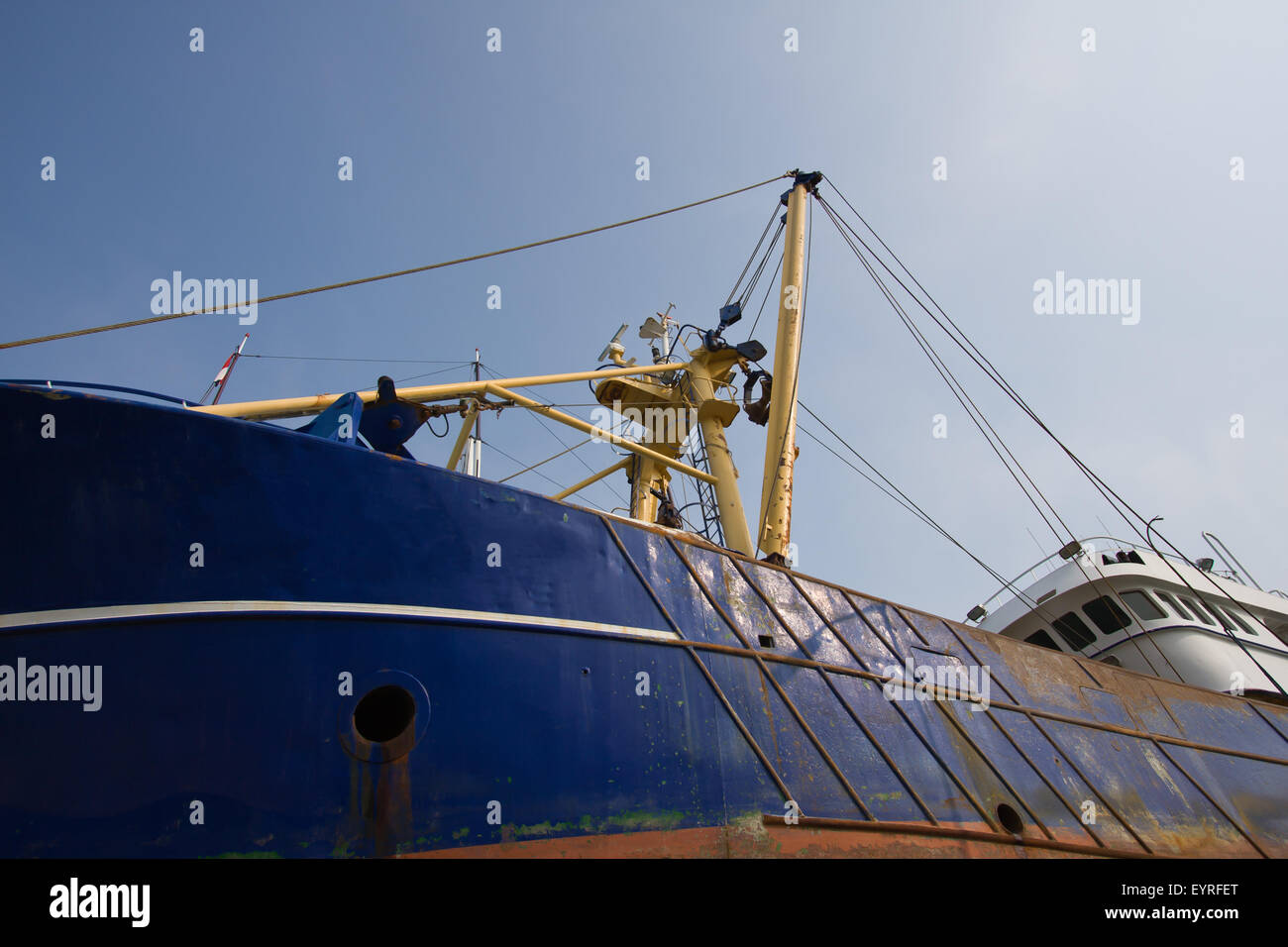 Big fishing cutter at a shipyard for maintenance Stock Photo - Alamy