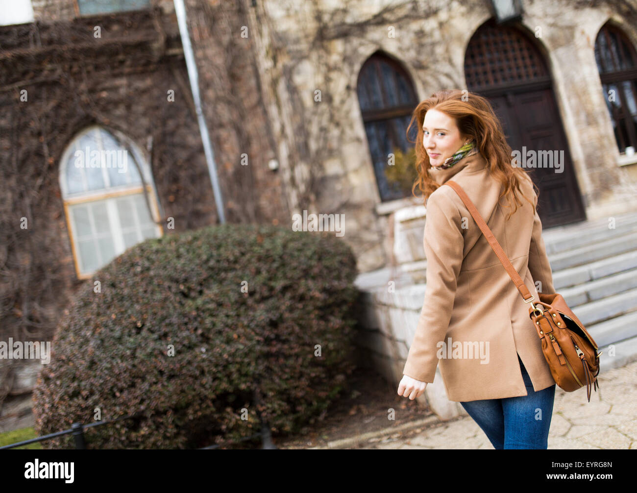 Young red hair university female student Stock Photo - Alamy
