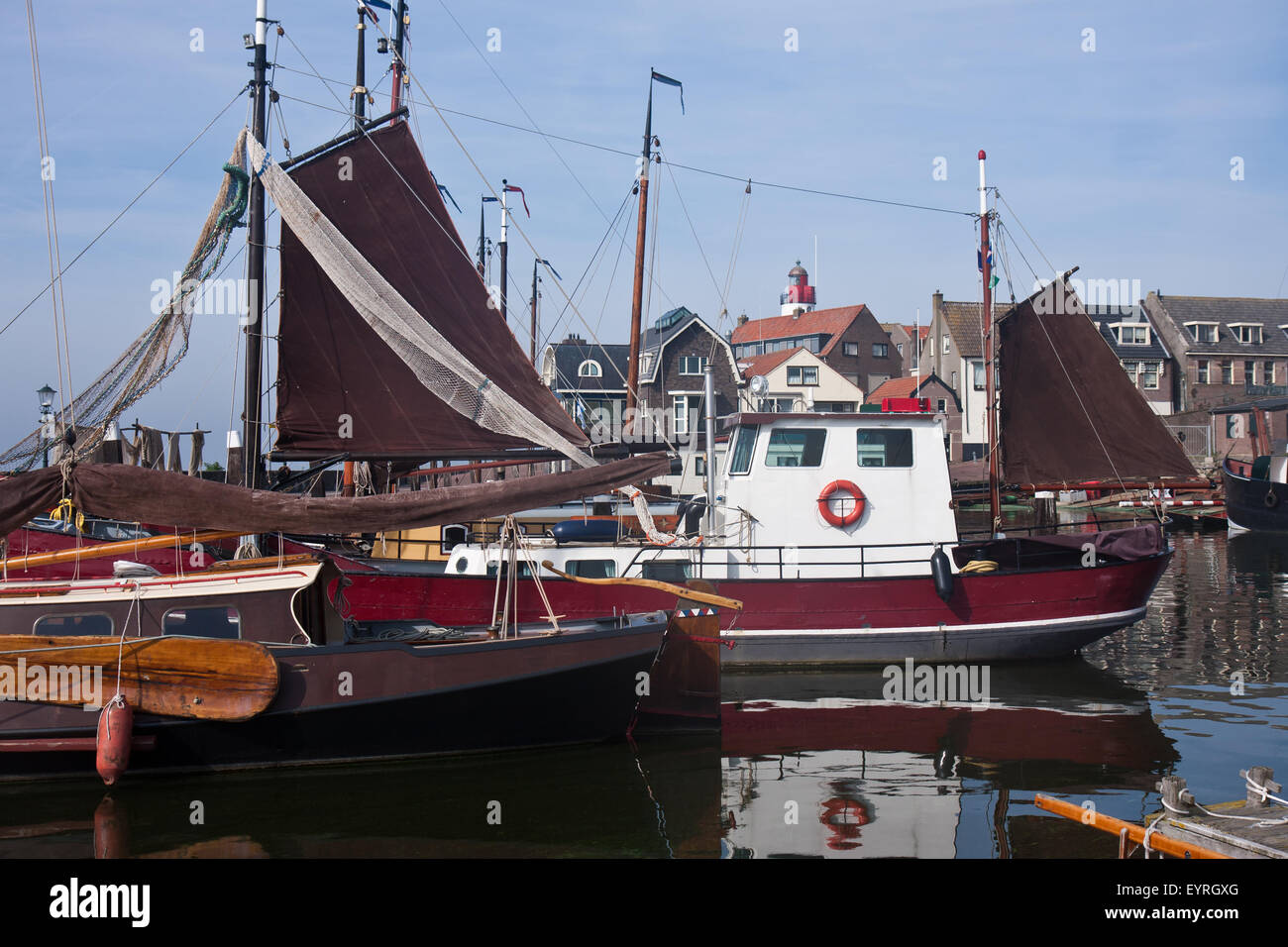 Dutch harbor of historic fishing village Urk with traditional ships ...