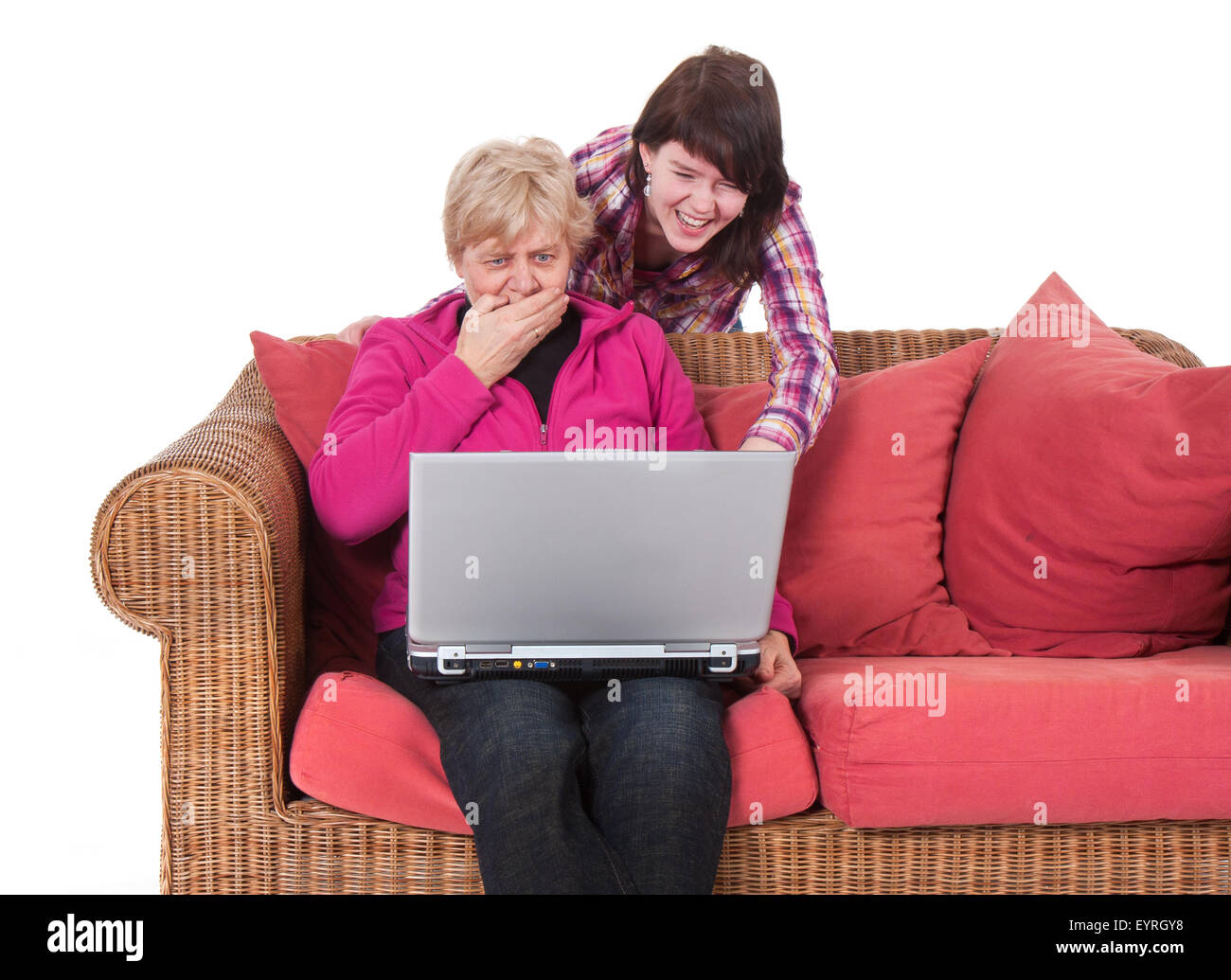 Granddaughter shows her grandma something amazing at the computer Stock ...