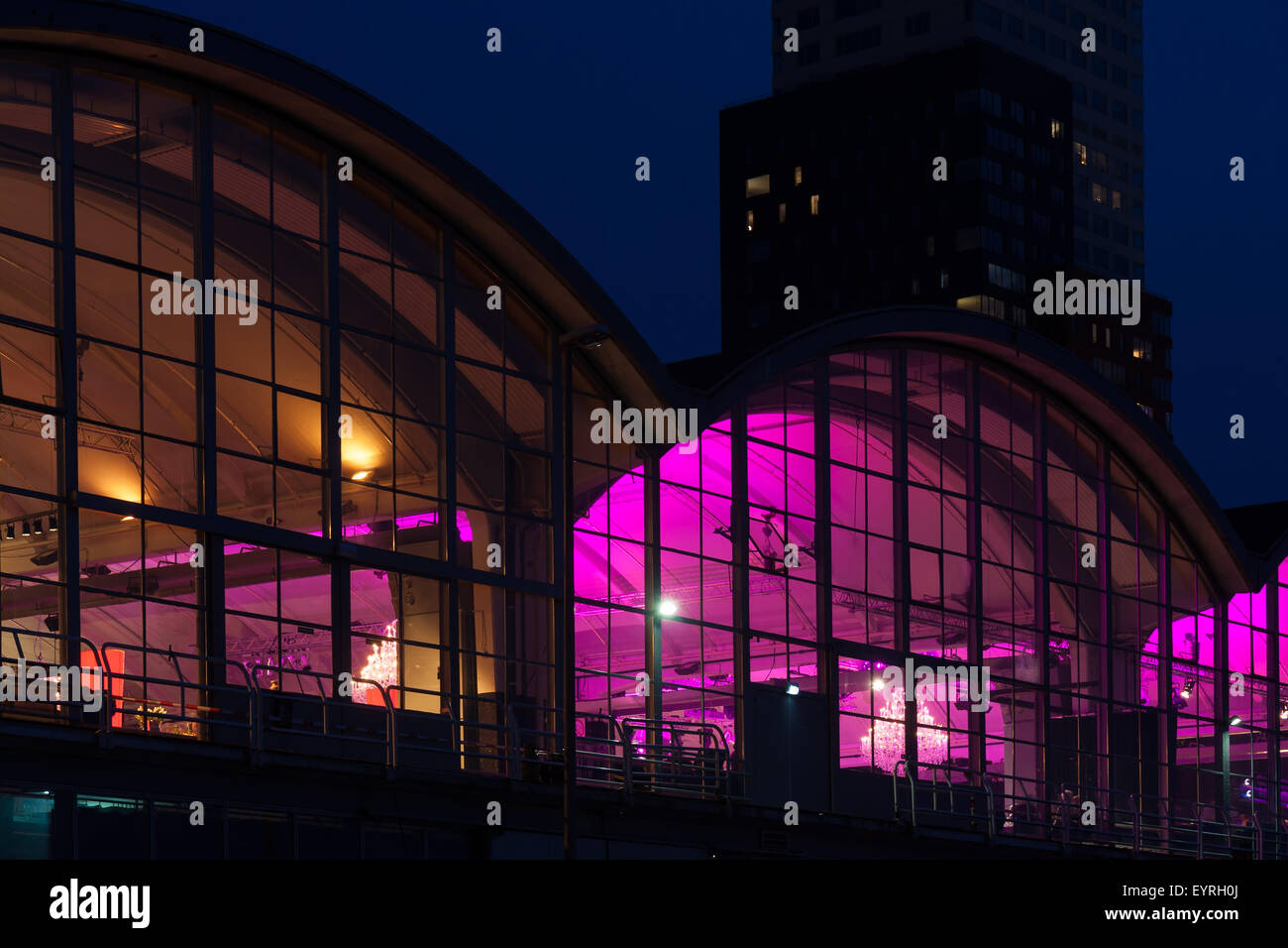 Modern building with purple ceiling at night, Rotterdam, the ...