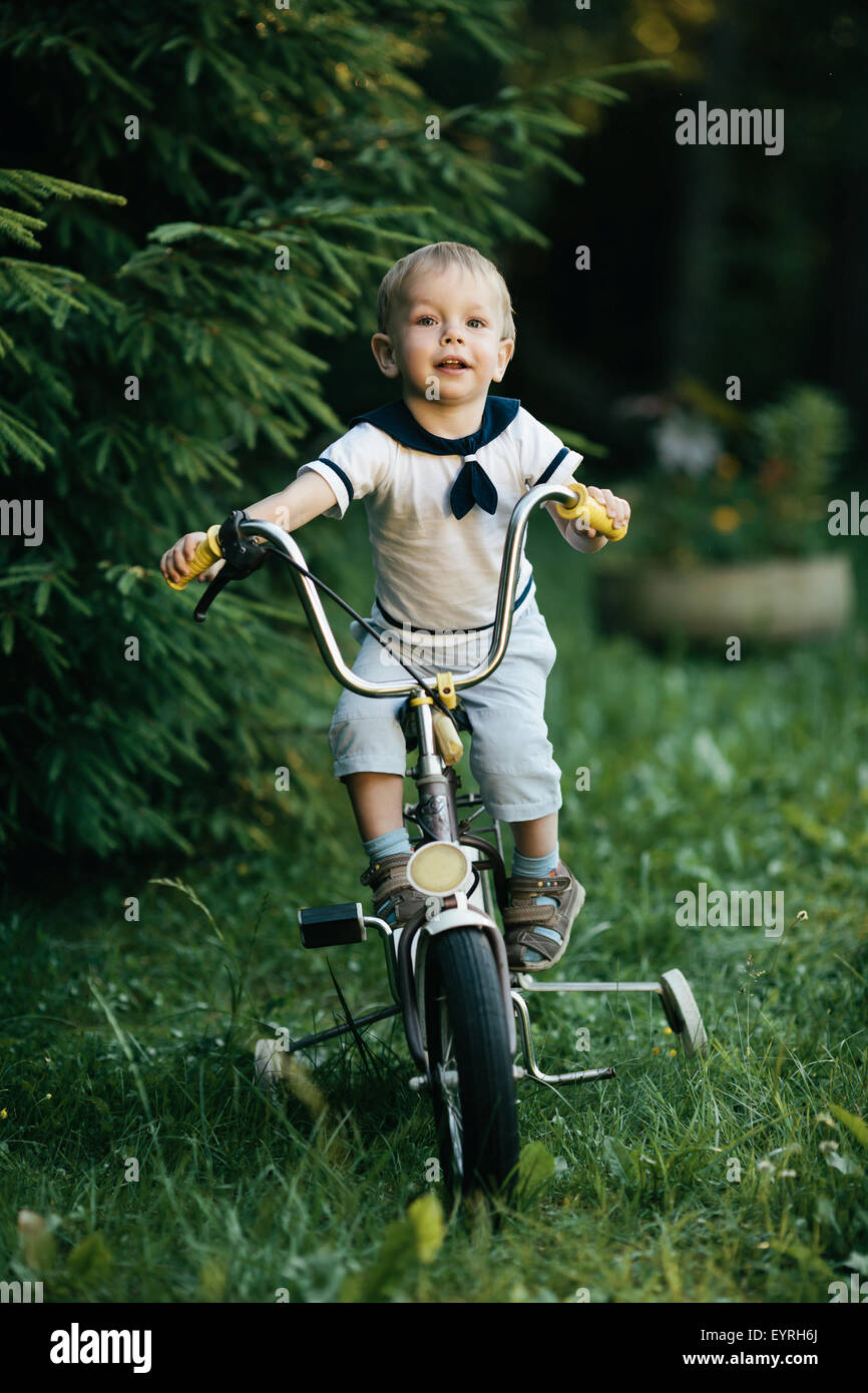 Boy on bike hi-res stock photography and images - Alamy
