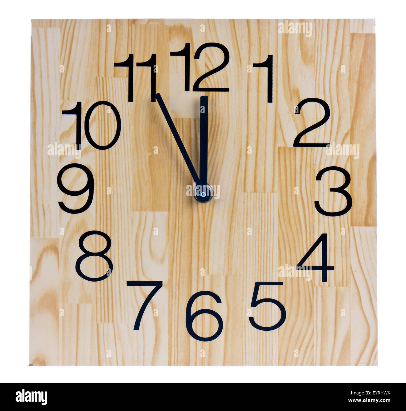 Wooden clock saying five to twelve Stock Photo - Alamy