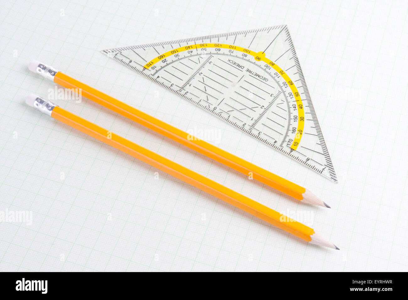 Mathematics ruler and pencils on squared paper Stock Photo - Alamy