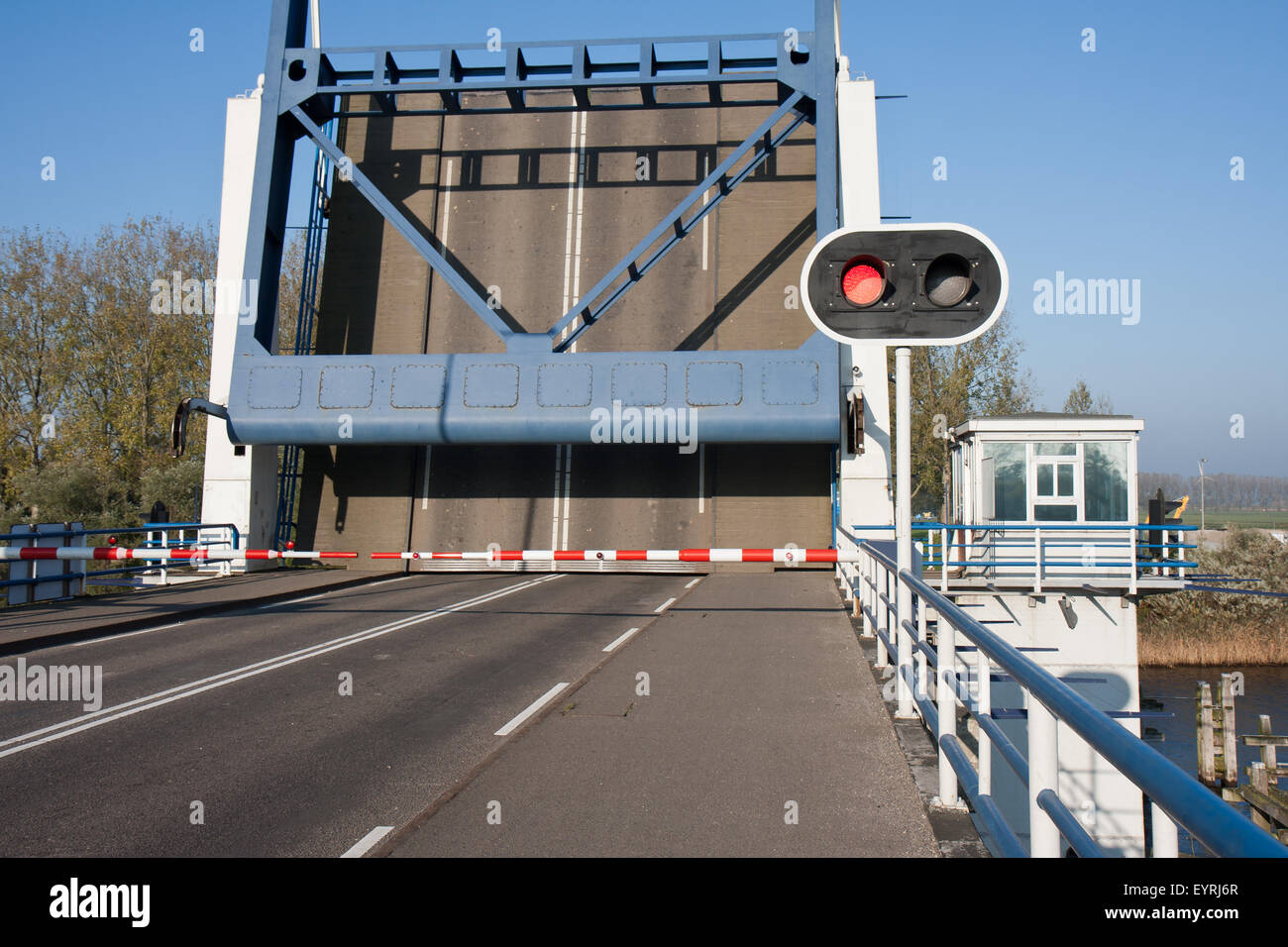 Opened bascule bridge in the Netherlands with red stop sign Stock Photo ...