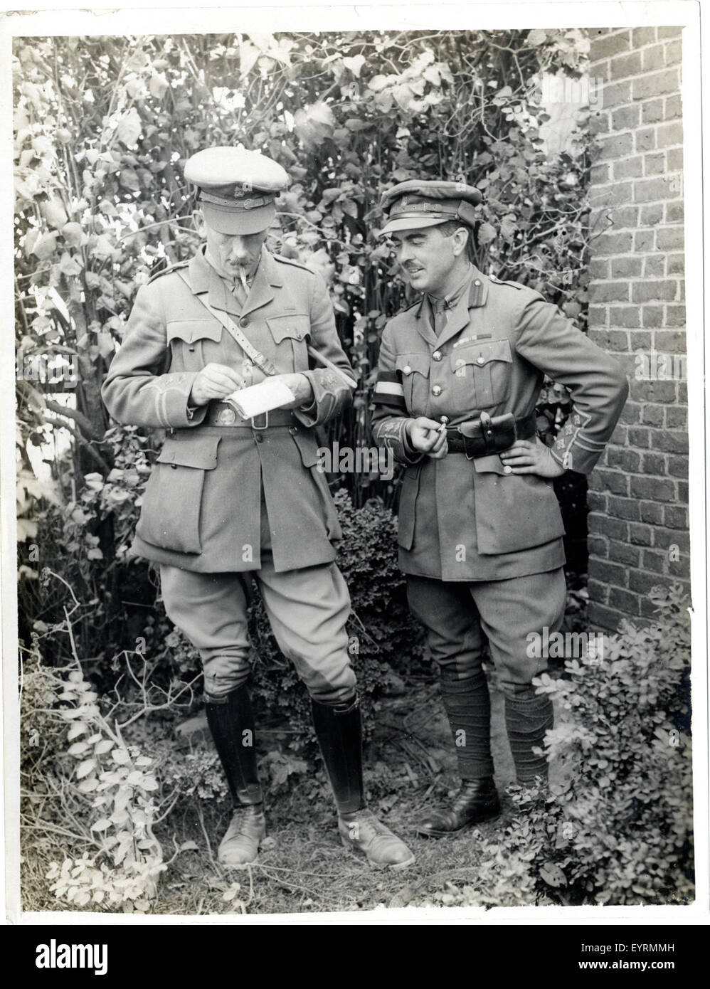 A photograph depicting a staff officer in France receiving instructions ...