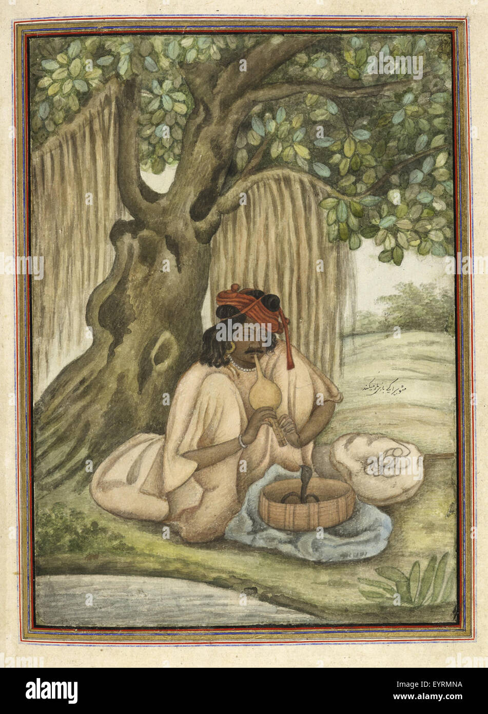 Photograph from 'Tashrih al-aqvam', depicting a snake-charmer of the ...